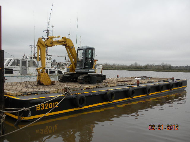 Spuds & has tanks for oil recovery